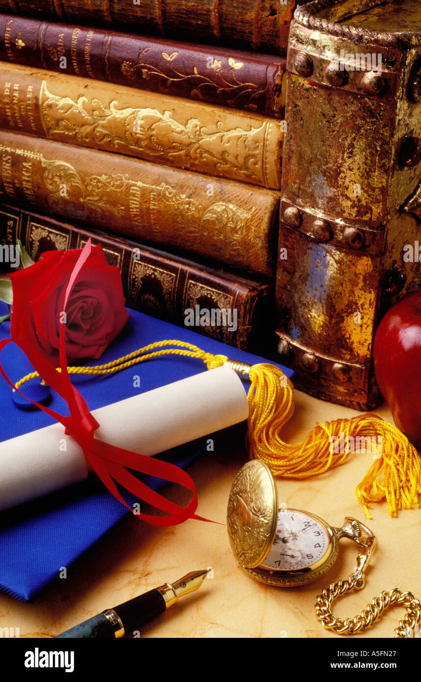 Graduation cap with diploma red rose old books pocket watch and ...