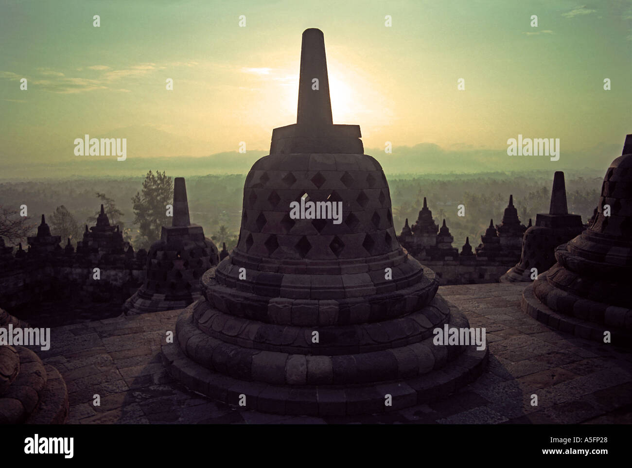 Sunrise view of Kedu Plain from the upper terraces of the giant stupa ...