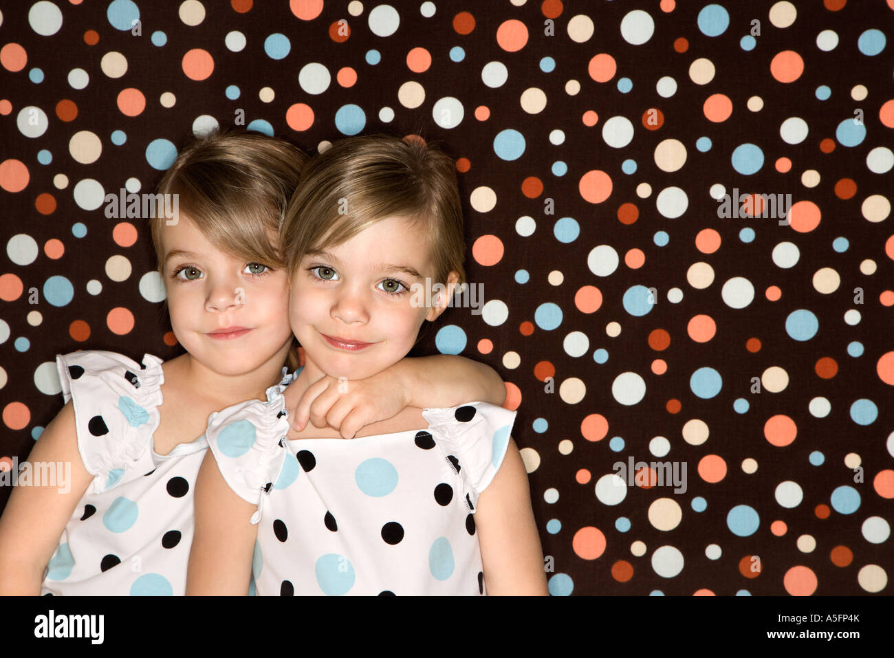 Female children Caucasian twins looking at viewer Stock Photo - Alamy