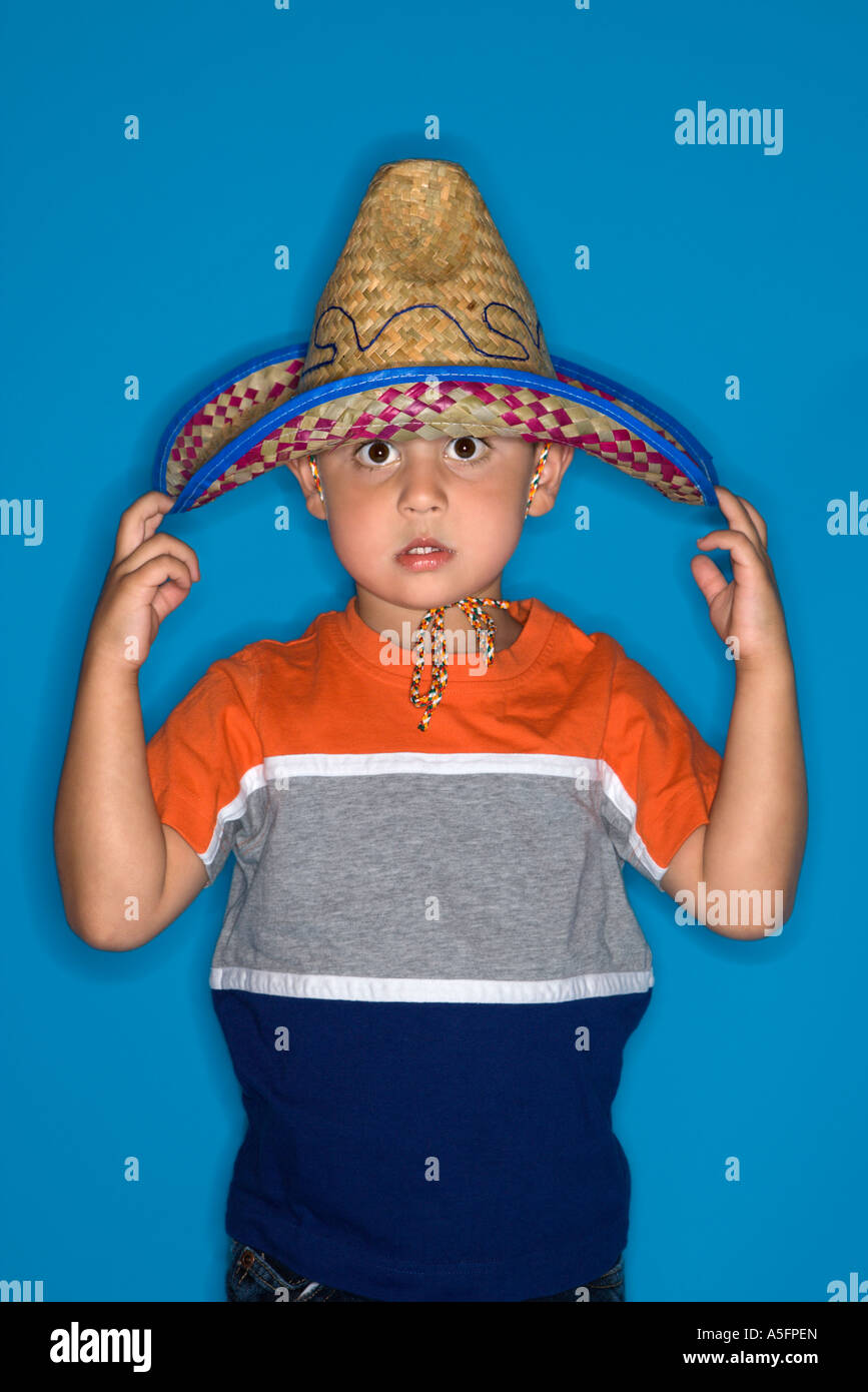 Male Hispanic boy wearing sombrero Stock Photo - Alamy