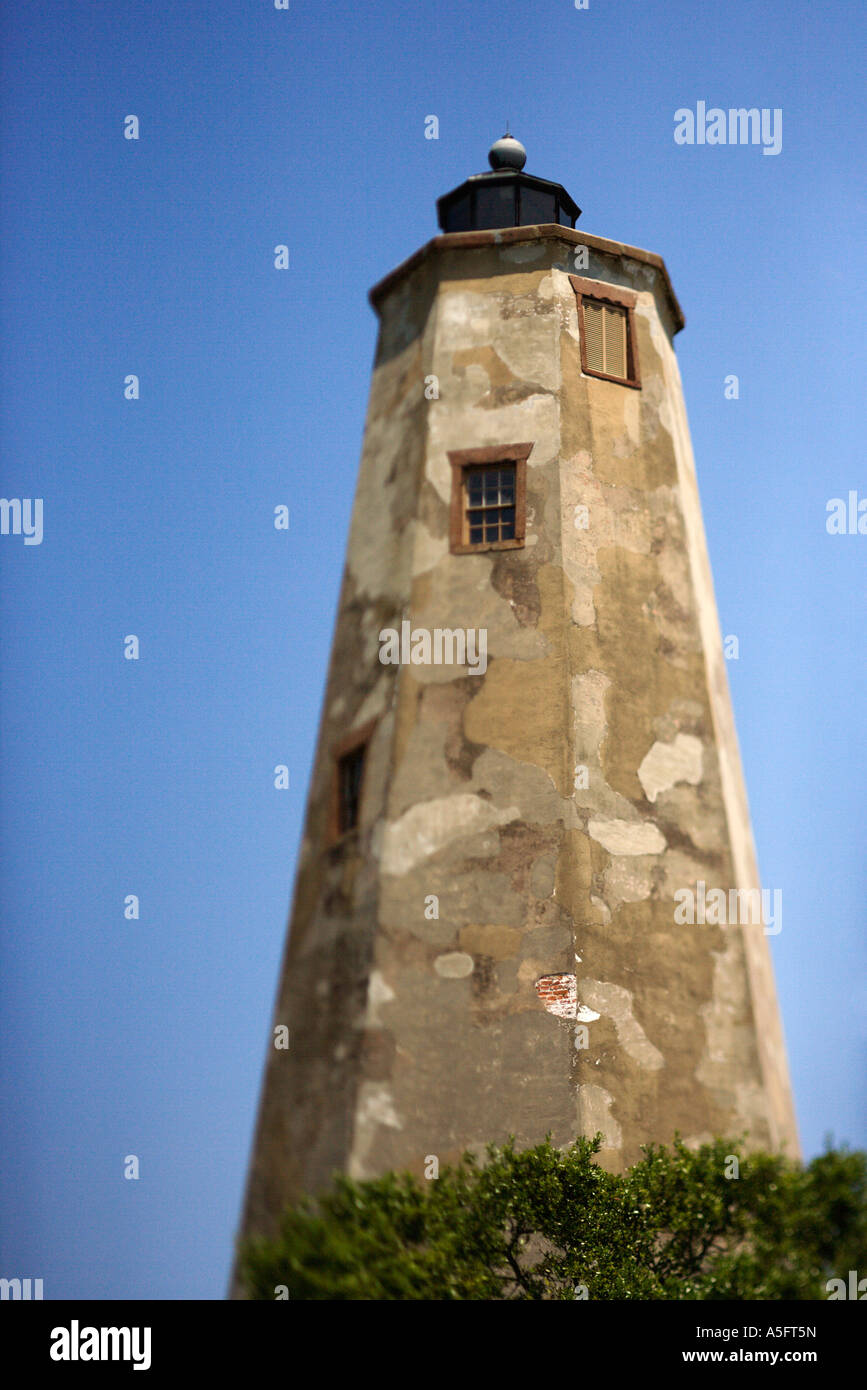 Worn and weathered lighthouse on Bald Head Island North Carolina Stock ...