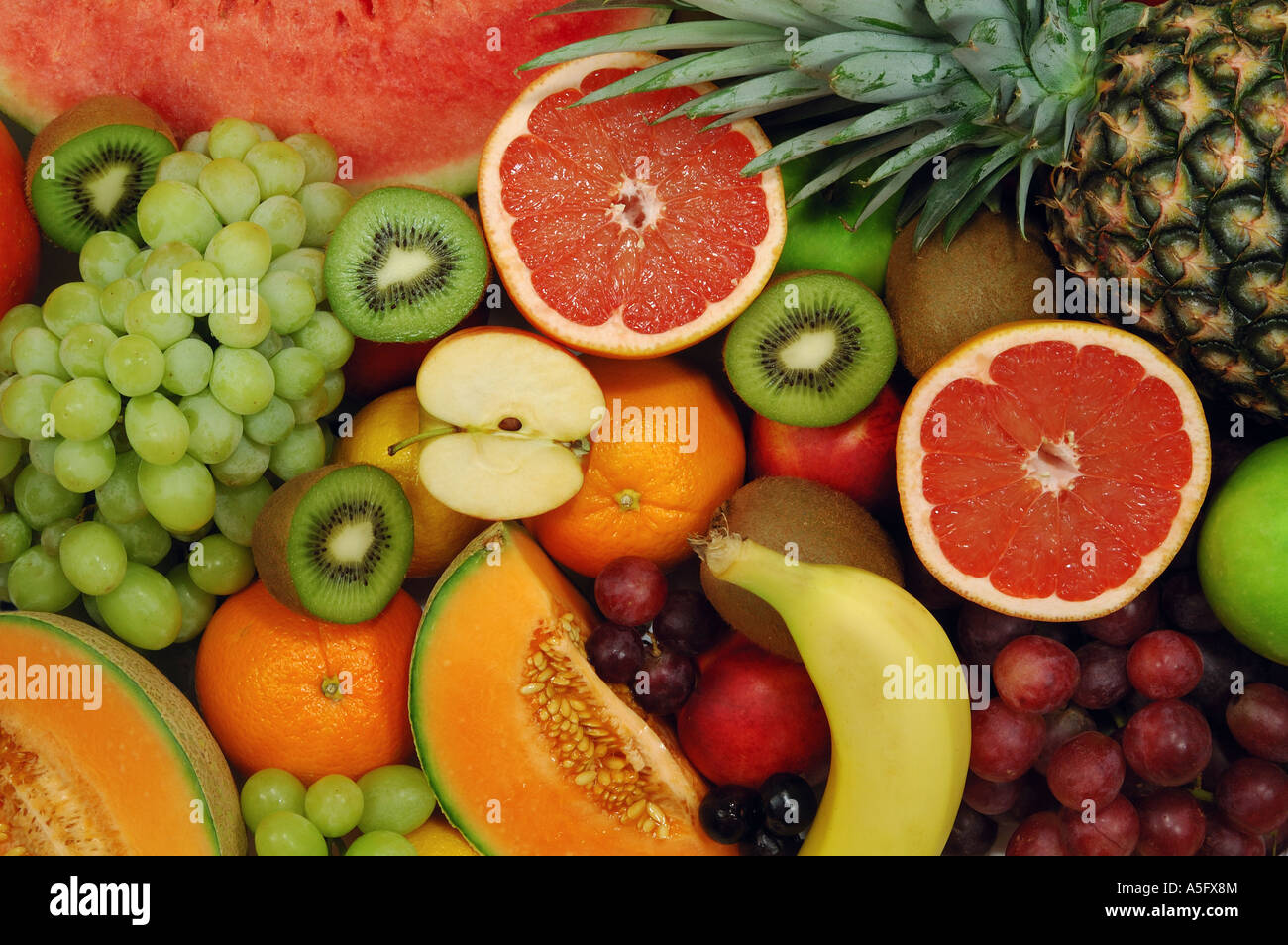 Set of different fresh fruits. Colorful background Stock Photo - Alamy