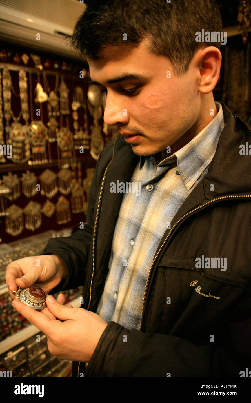 TURKOMAN SALESMAN FROM AFGHANISTAN SHOWING TRADITIONAL JEWELLERY IN THE ...