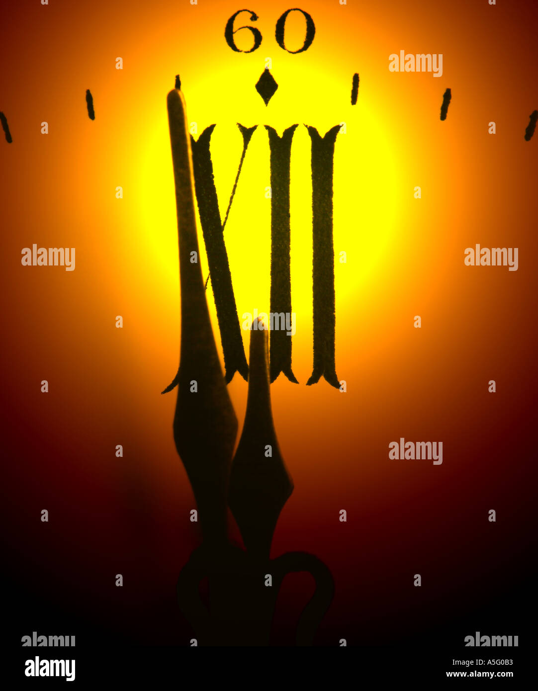 Clock at one minute to midnight Stock Photo - Alamy