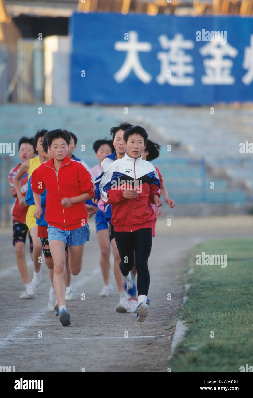 Chinese runners on track Stock Photo - Alamy