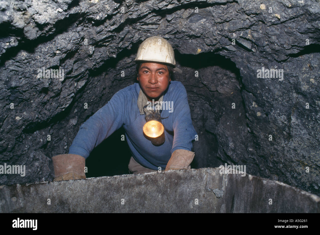 Miner working underground in Potosi silver mine Bolivia Stock Photo - Alamy