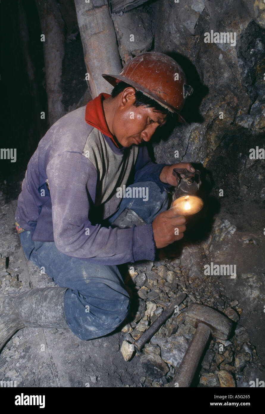 Miner working underground in Potosi silver mine Bolivia Stock Photo - Alamy
