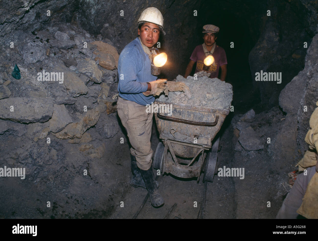 Miner working underground in Potosi silver mine Bolivia Stock Photo - Alamy