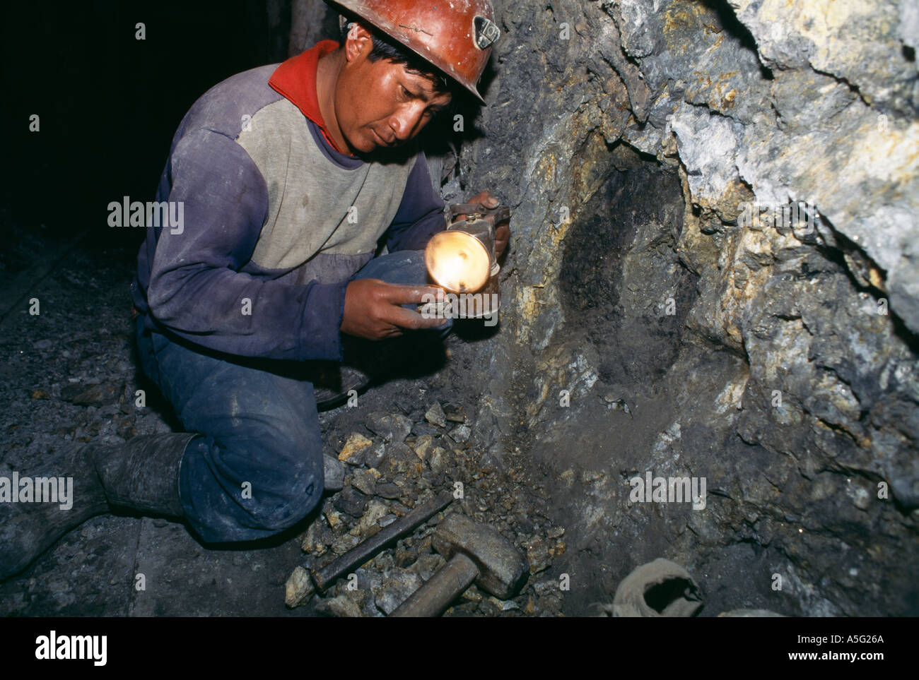 Miner working underground in Potosi silver mine Bolivia Stock Photo - Alamy