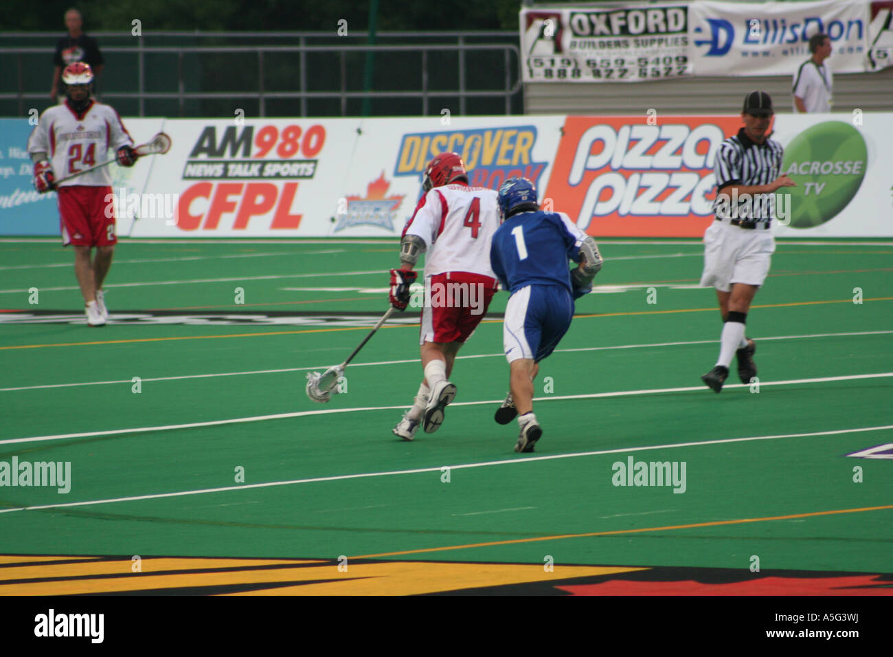 Masatoshi Ushu of Team Japan pursues Geoff Snider of Team Canada for a ...