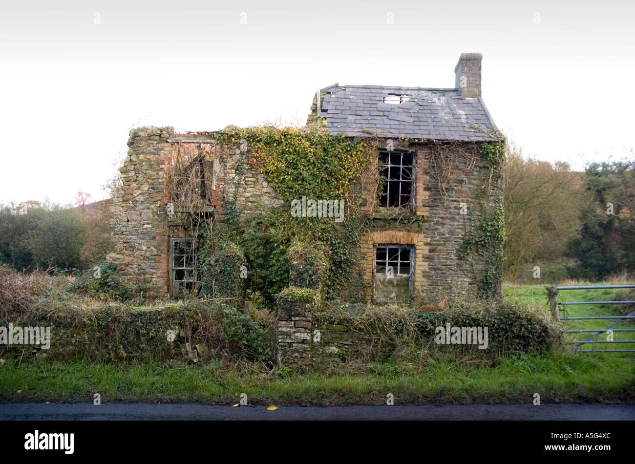 Run down detached cottage near Three Crosses on the Gower Peninsular ...