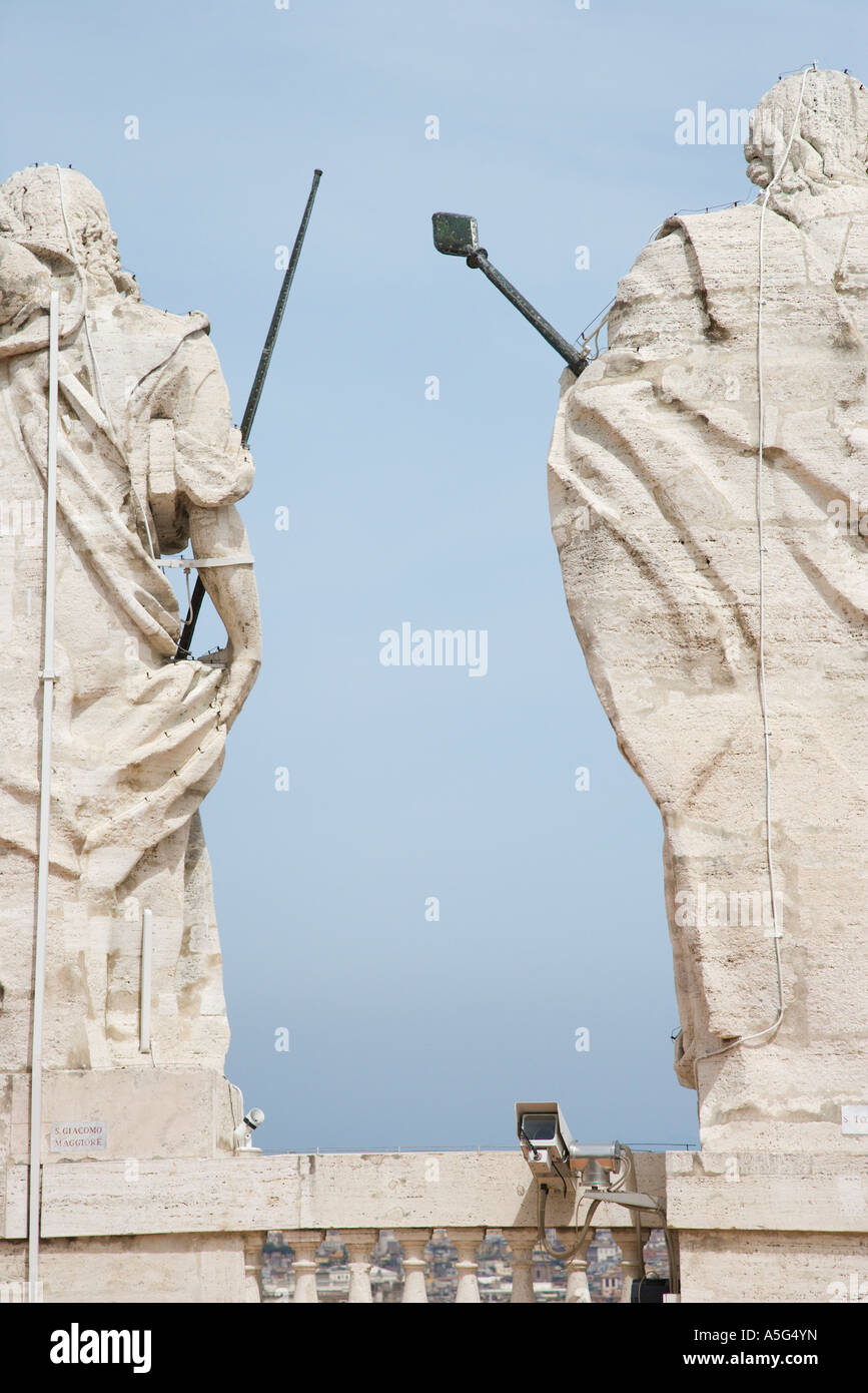 Back view of Roman statues with blue sky in Rome Italy Stock Photo - Alamy