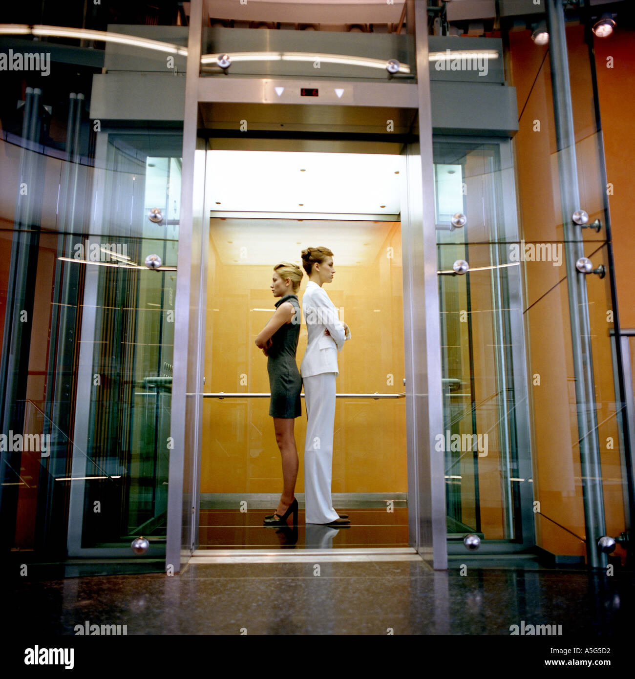 Women in a lift Stock Photo - Alamy