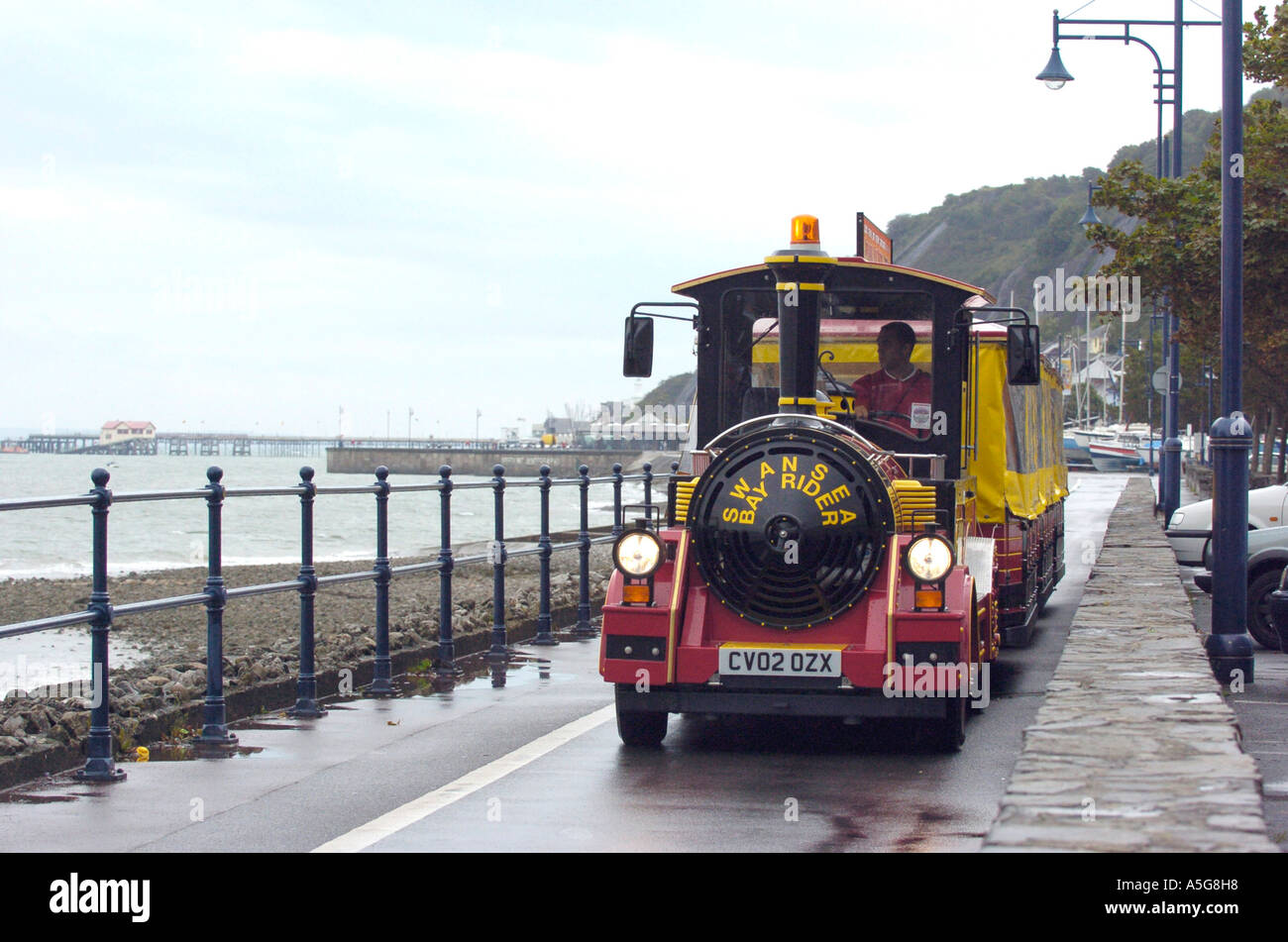 LAND TRAIN ON THE SEAFRONT AT MUMBLES VILLAGE NEAR SWANSEA, UK Stock ...