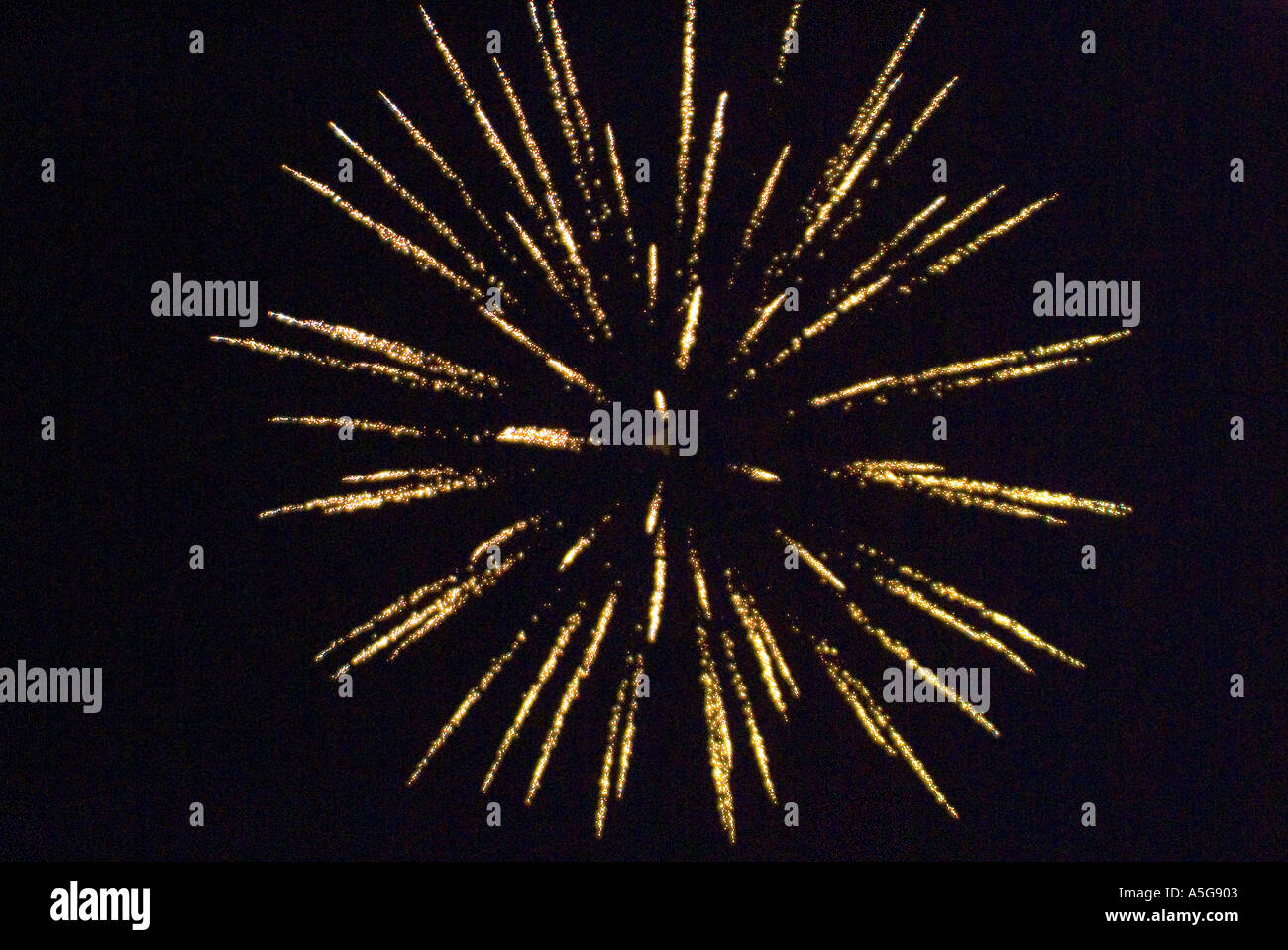 Explosion of Fireworks taken on bonfire night against a dark black ...