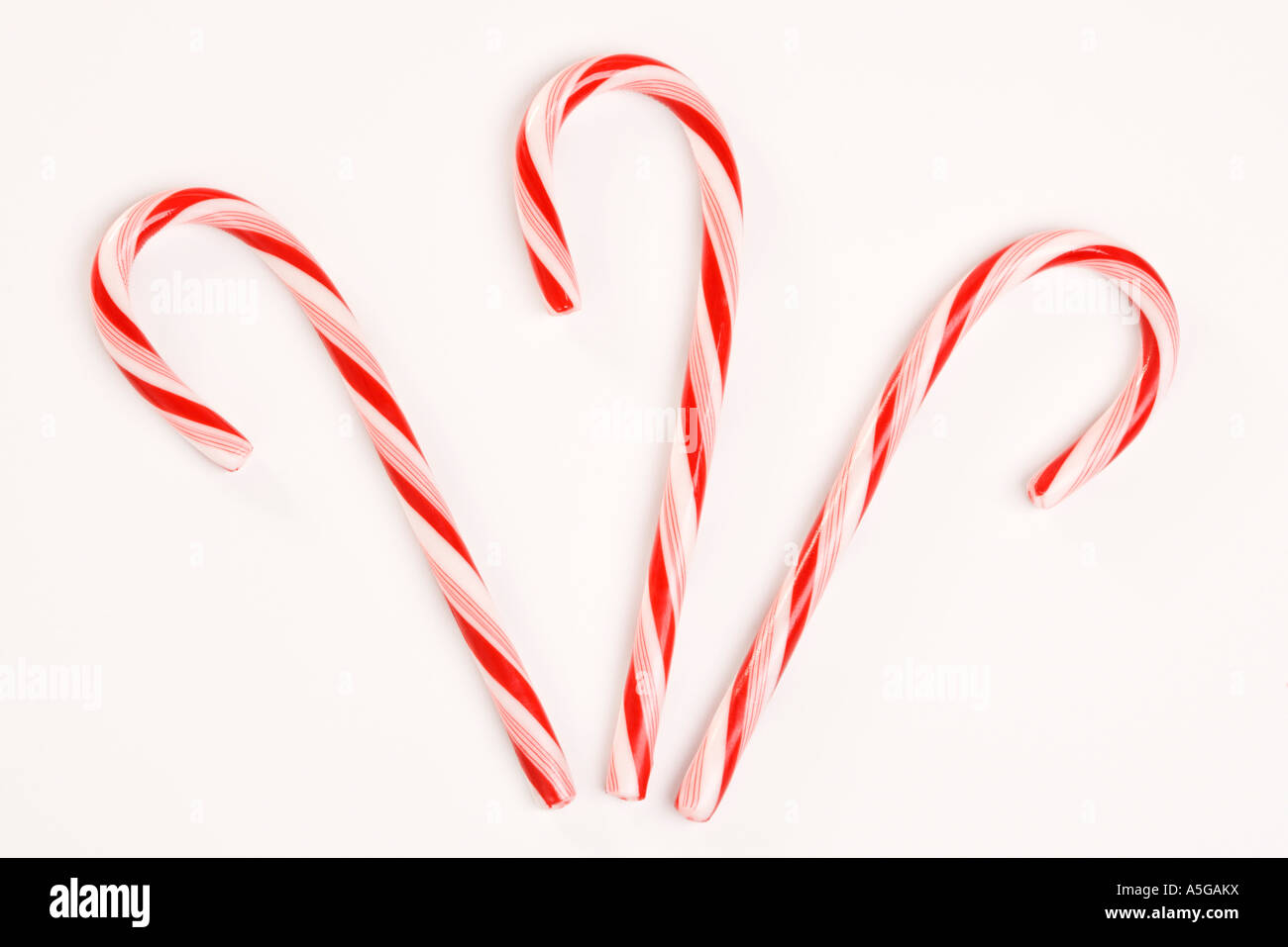 Still life of three candy canes Stock Photo - Alamy