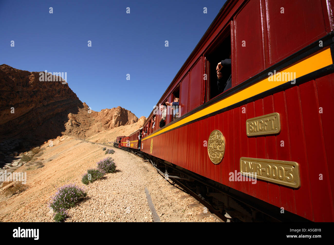 Horizontal landscape detail of Red Lizard train leading the eye into ...