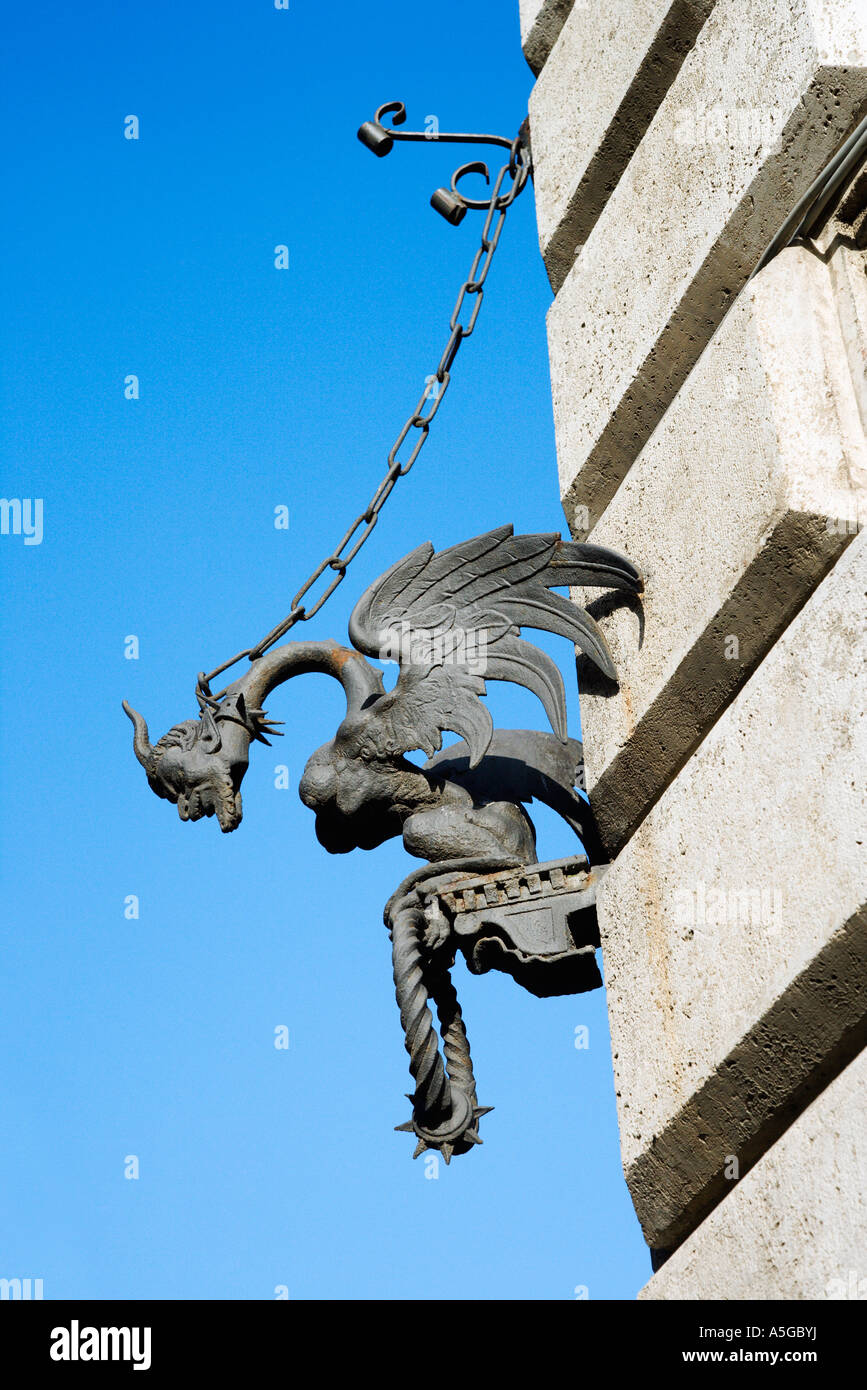 Winged gargoyle chained to wall Stock Photo - Alamy