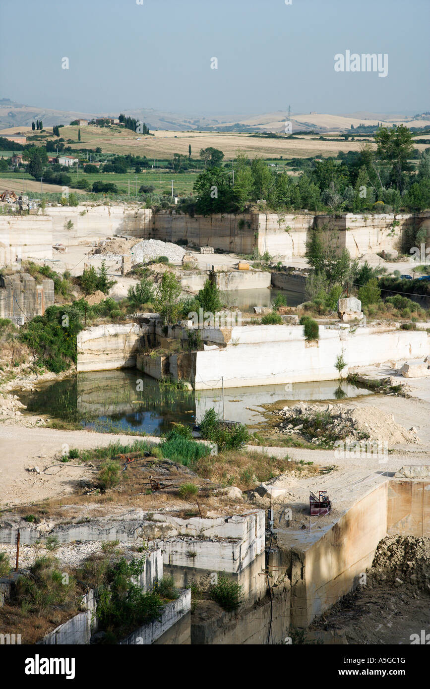 Open mine travertine stone quarry Stock Photo - Alamy