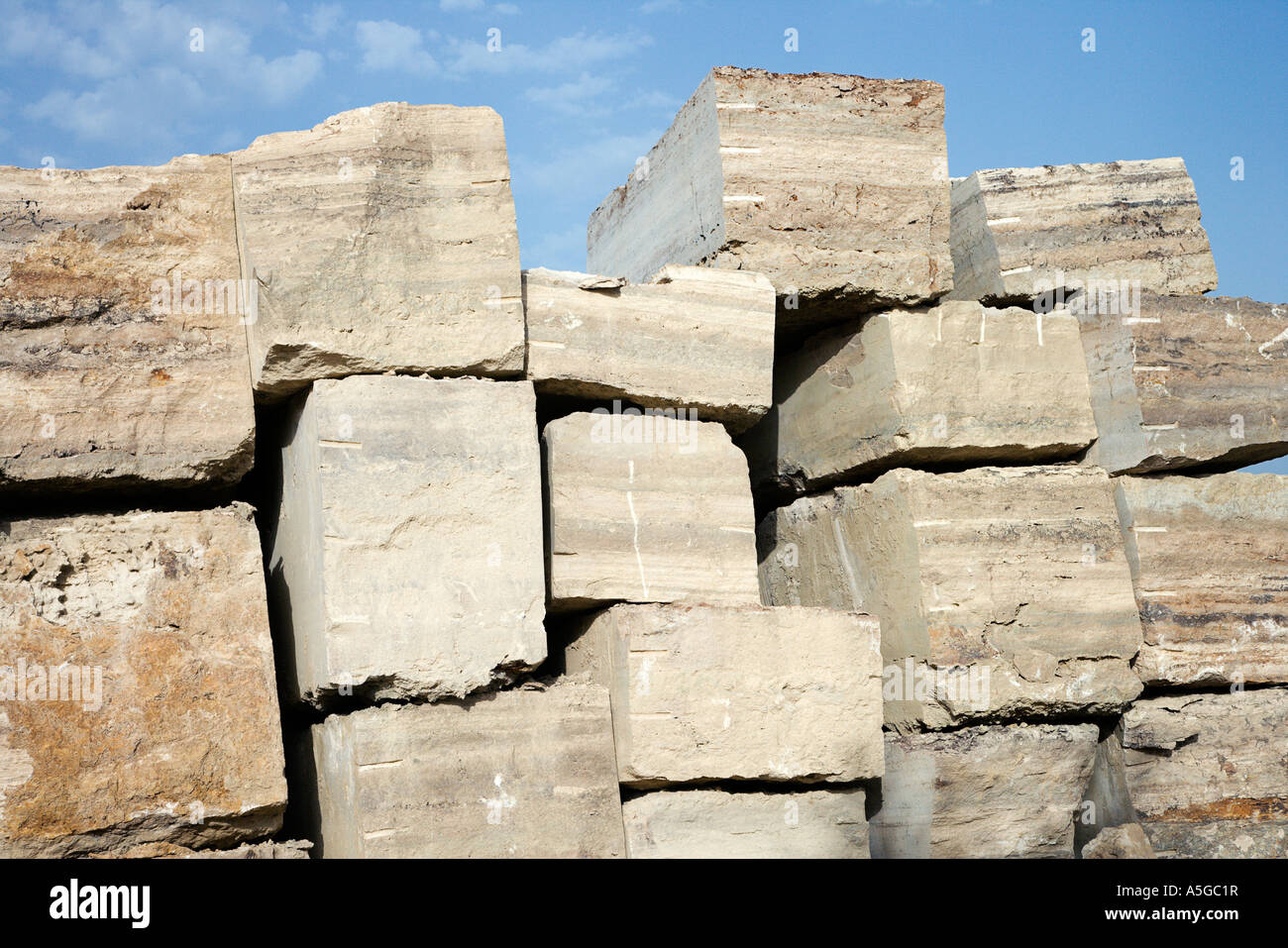 Travertine stone excavated from open mine quarry Stock Photo - Alamy