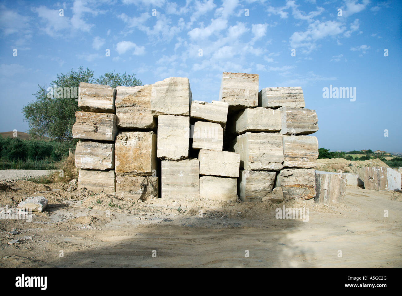 Travertine stone excavated from open mine quarry Stock Photo - Alamy