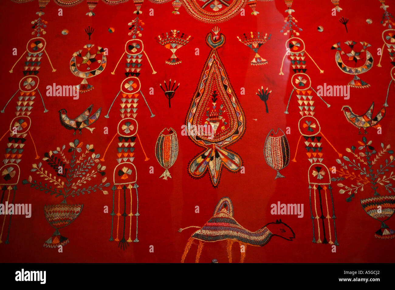 Horizontal close up image of ancient berber textile exhibit in Guellala ...