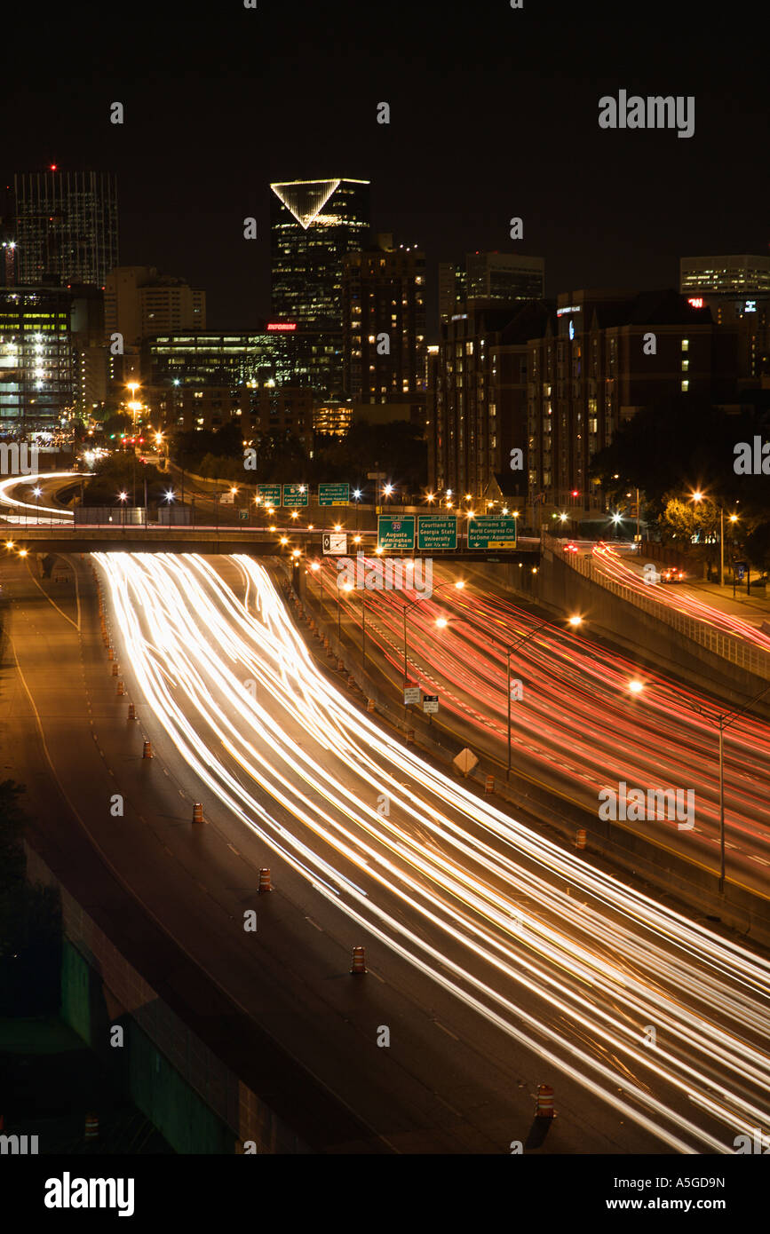 Nightscape of Atlanta Georgia skyline with blurred automobile lights on ...