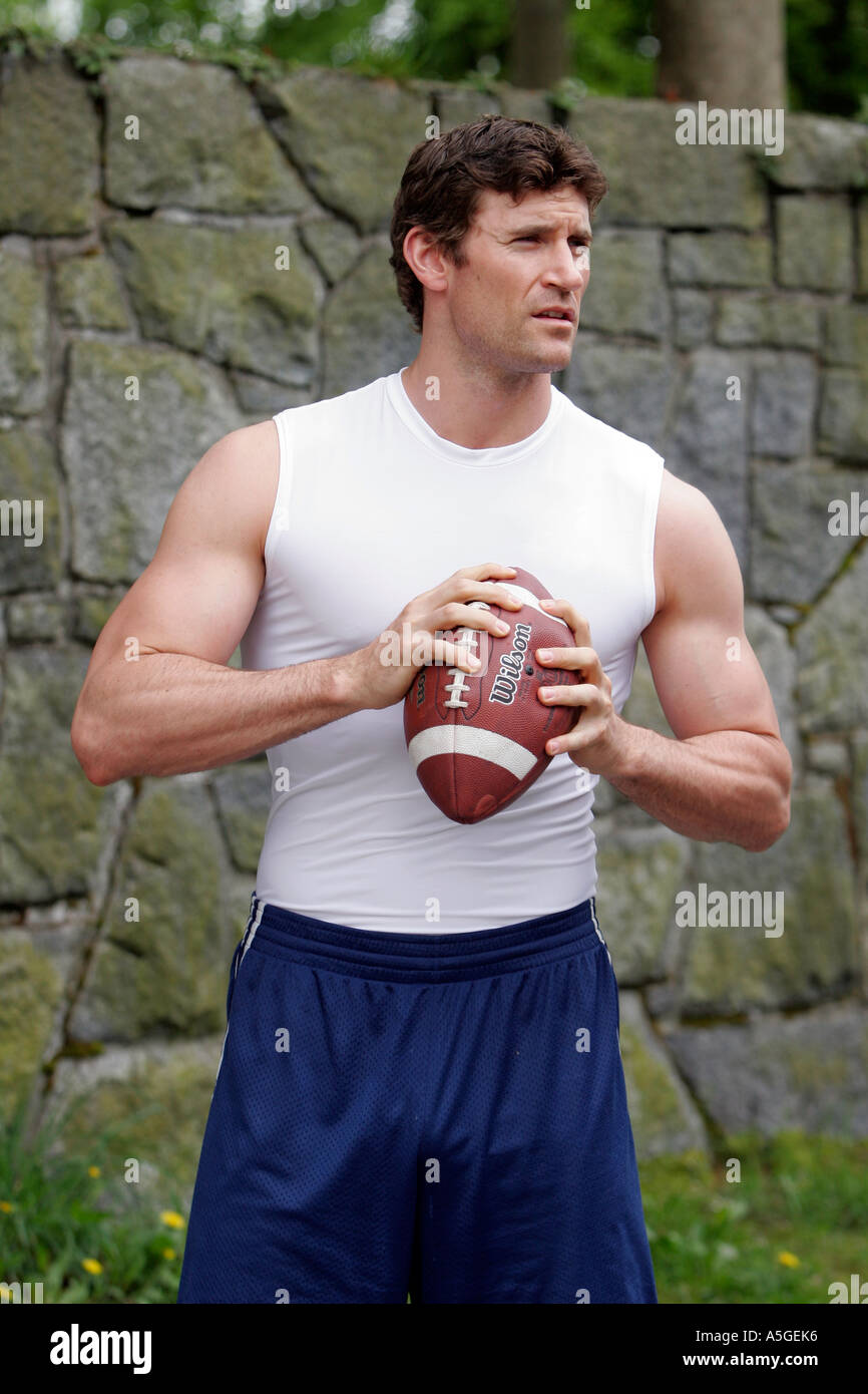 fit male model football Stock Photo - Alamy