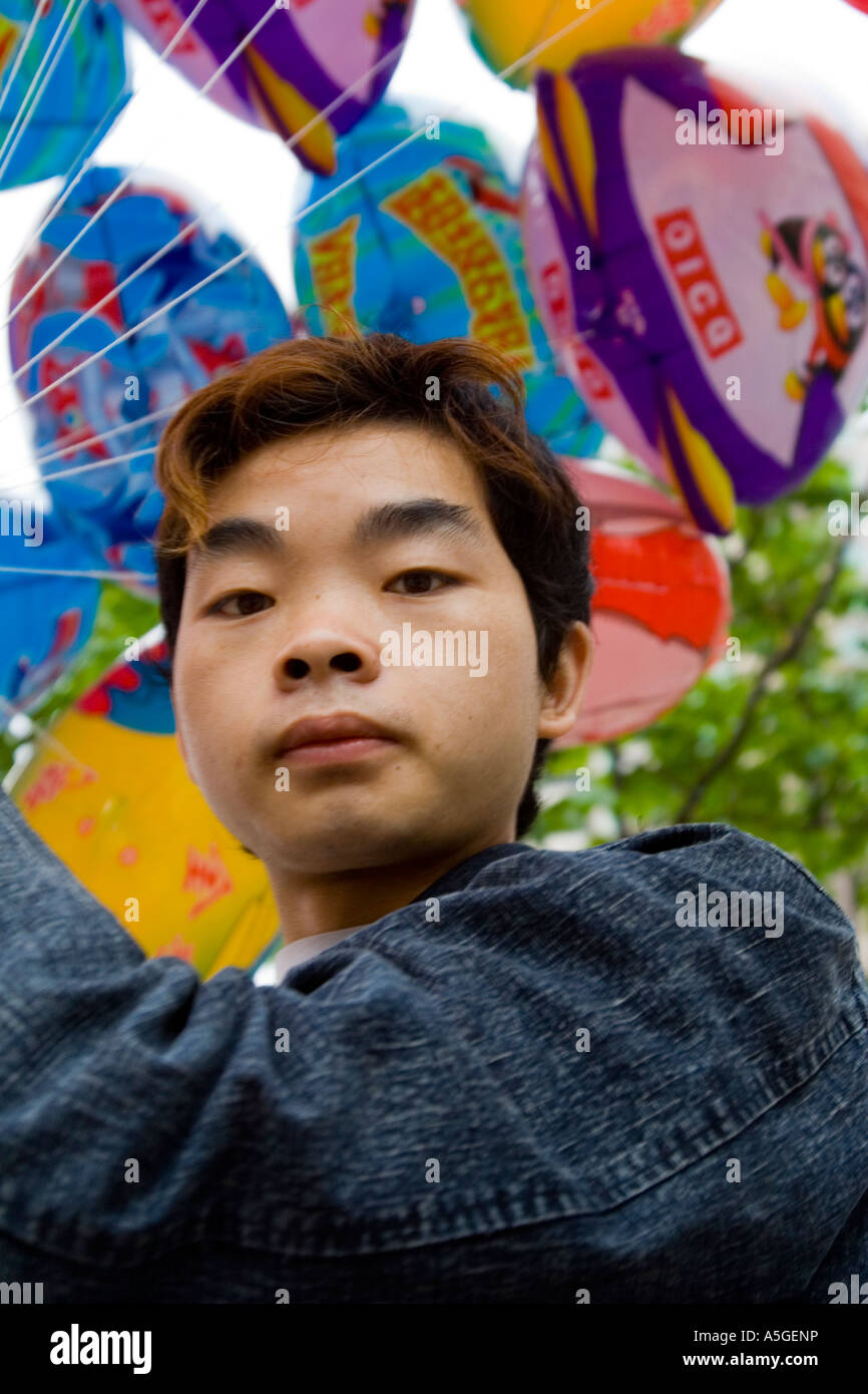 Boy Selling Balloons Guangzhou China Stock Photo - Alamy
