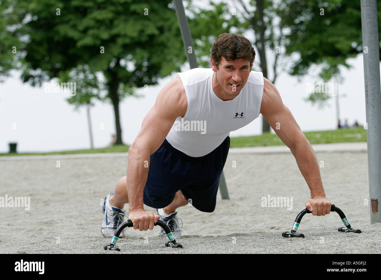 Man stretching arms wide open hi-res stock photography and images - Alamy