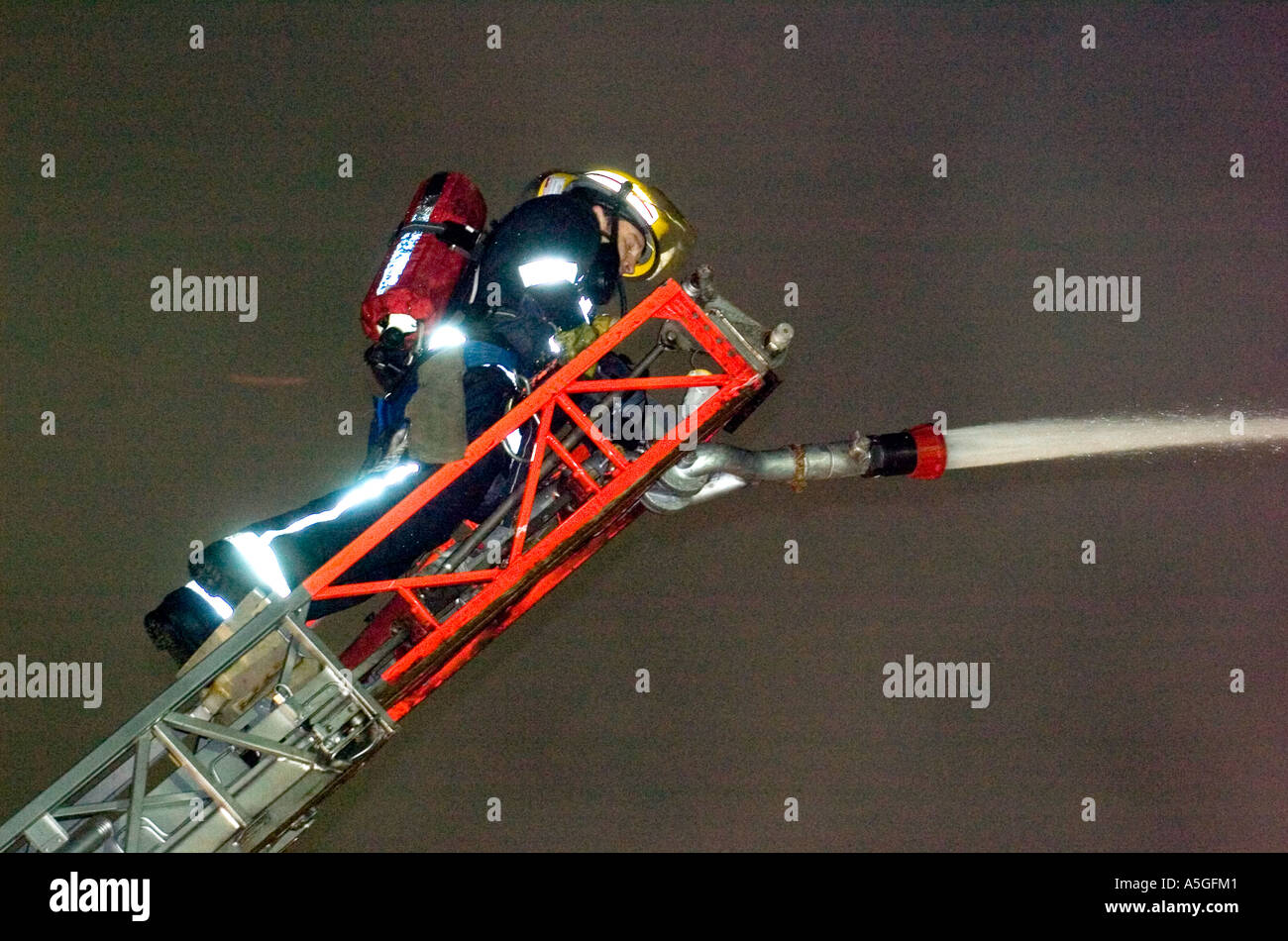 Firemen from Mid and West Wales Fire Brigade tackle the Langland Court ...