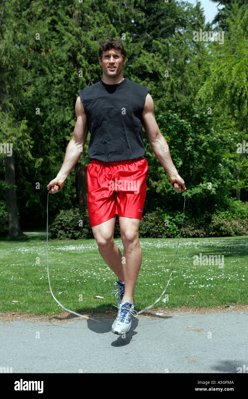 male skipping exercising outside Stock Photo - Alamy