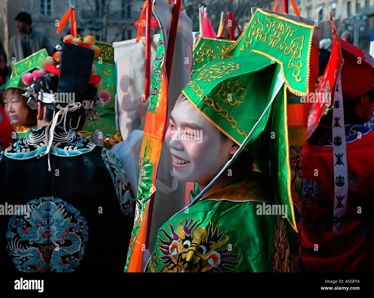 Members of the Chinese community in Paris gather in full regalia for ...