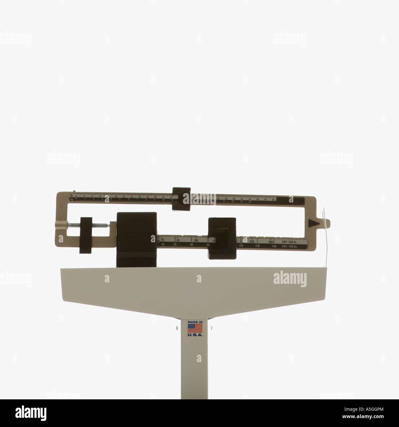 Still life of standing weight scale Stock Photo - Alamy