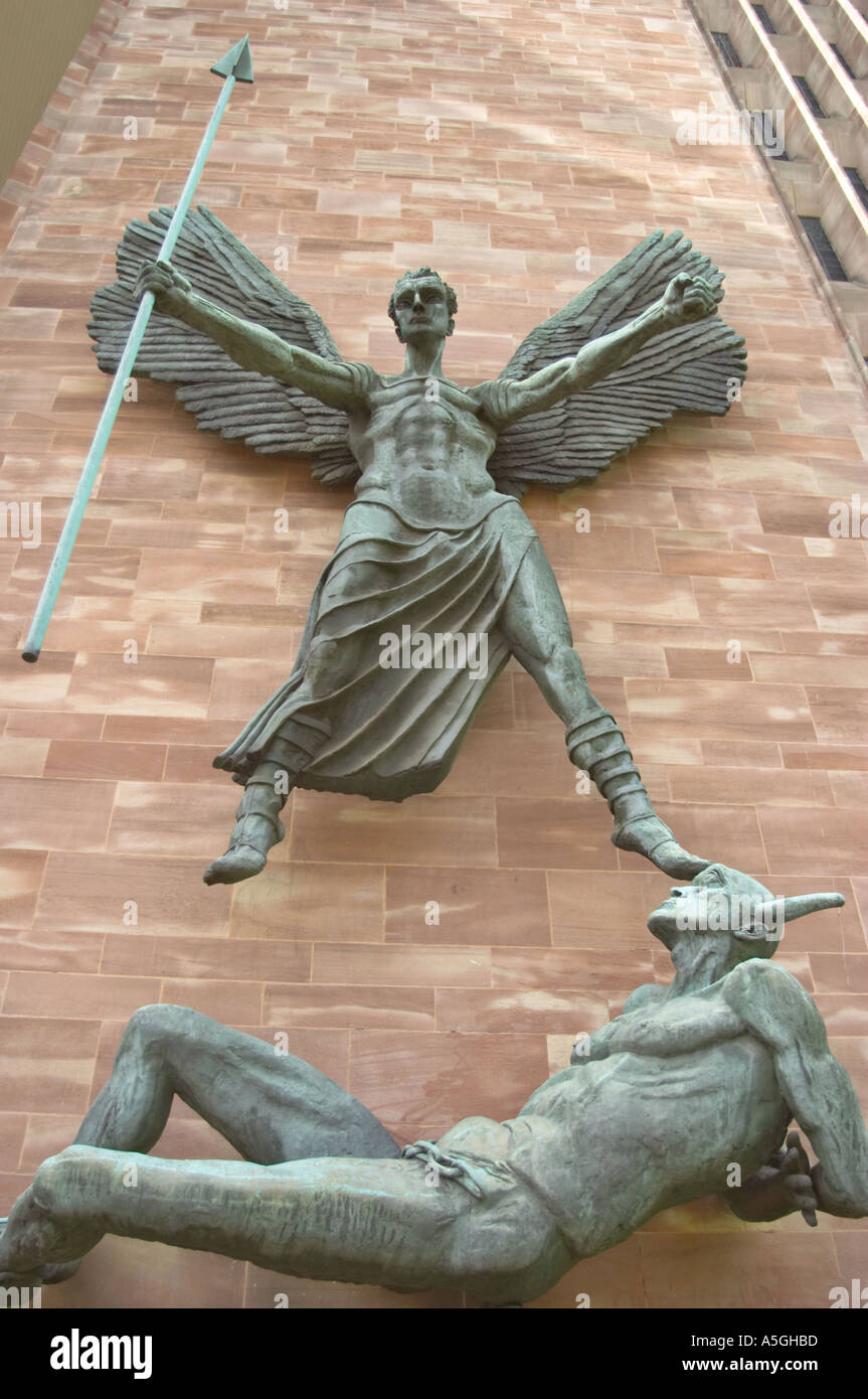 The statue of Saint Michael defeating Satan on the side of the new ...