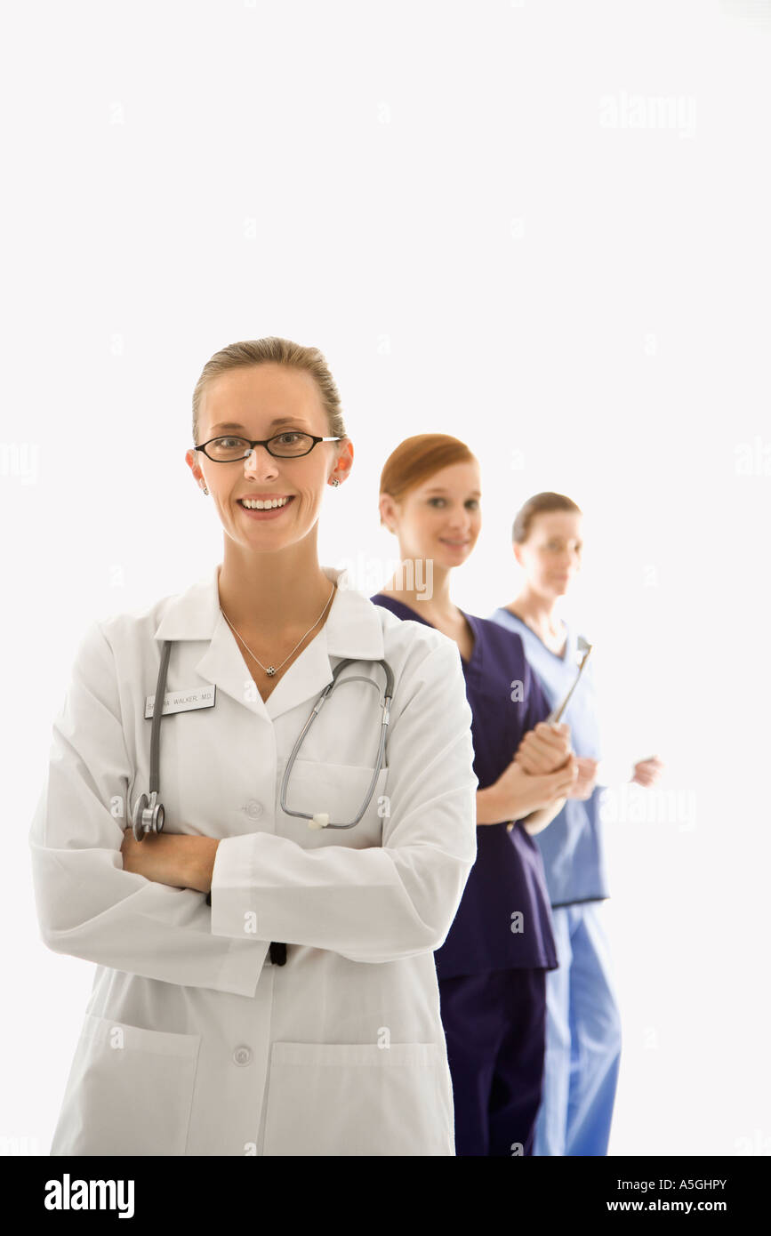 Portrait of smiling Caucasian medical healthcare workers in uniforms ...