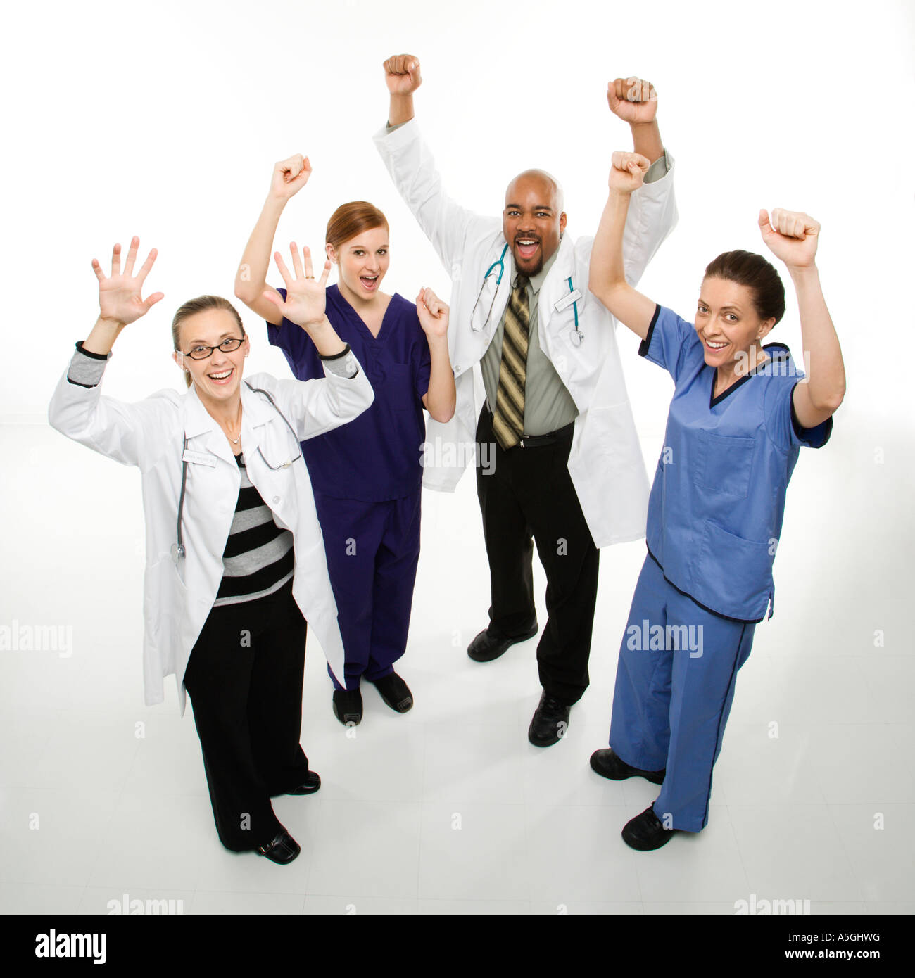 Portrait of doctors and nurses cheering Stock Photo - Alamy
