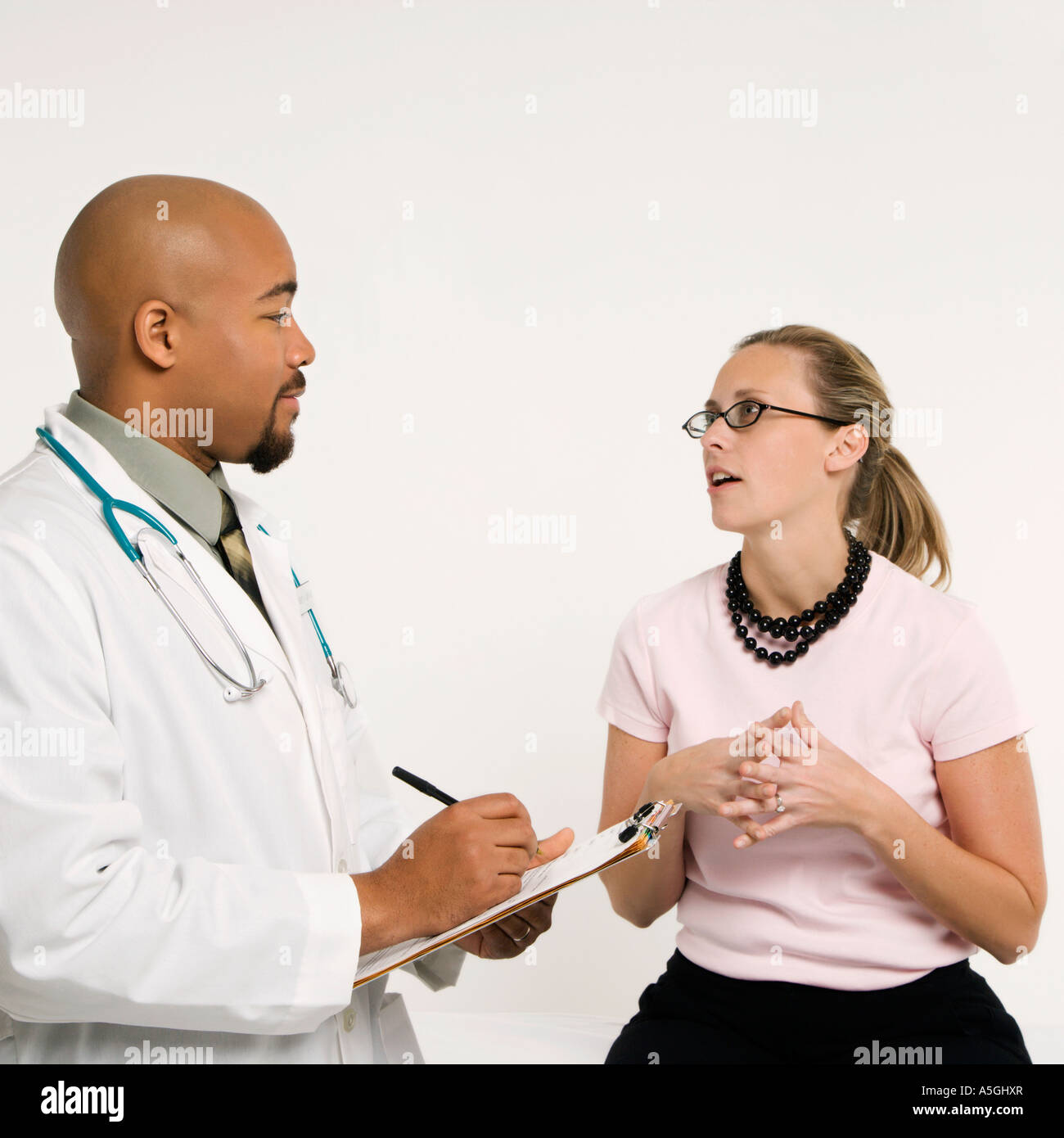 Doctor and patient having discussion Stock Photo - Alamy