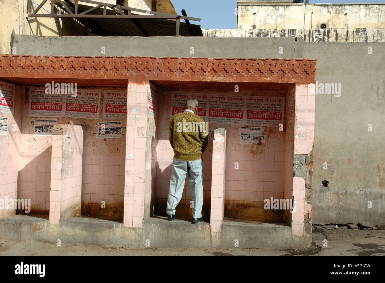 a man at a public restroom, India, Rajasthan, Jaipur Stock Photo - Alamy