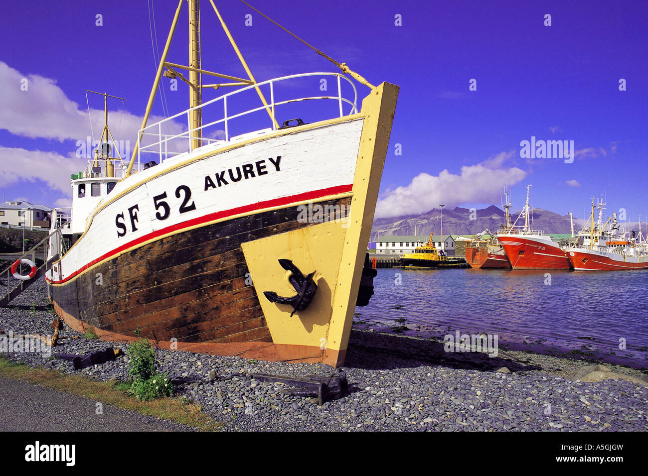 Beached fishing-boat, the Akurey, in the harbour at Hofn, Iceland Stock ...