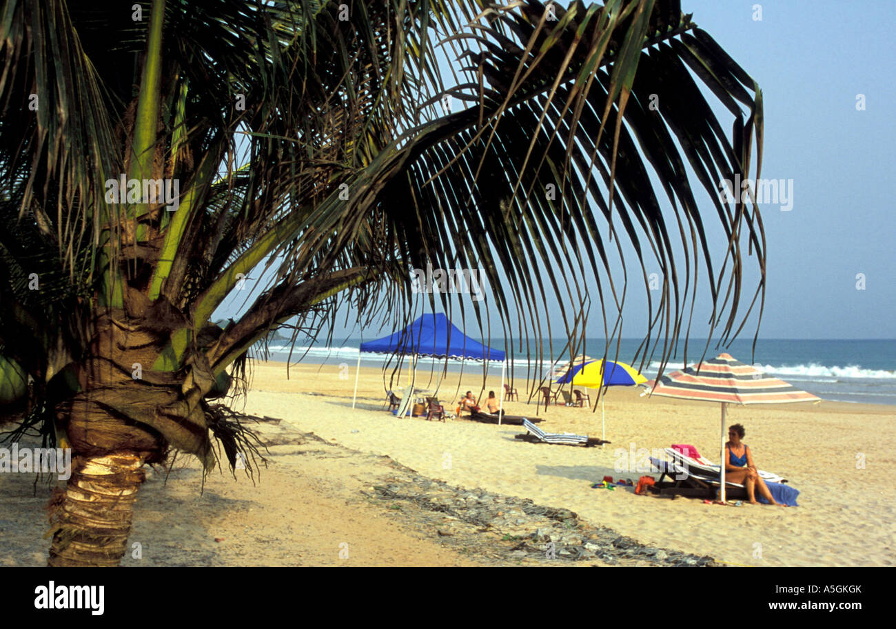 tourists lying at beach, Ghana Stock Photo - Alamy
