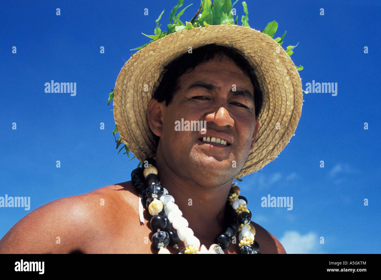 Polynesian man with straw hat, French Polynesia Stock Photo - Alamy