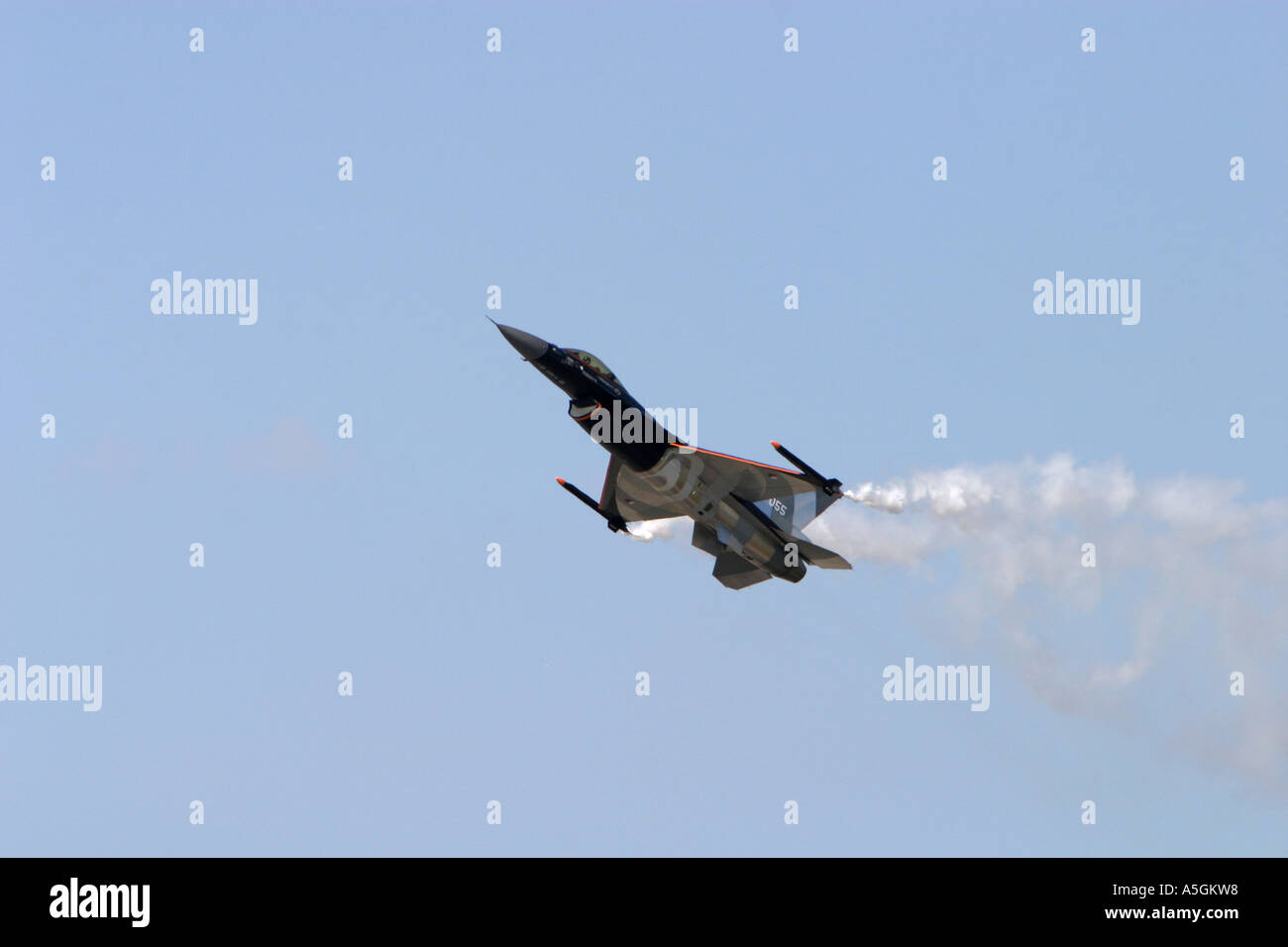 F16 military fighter jet performing an acrobatic display Stock Photo ...