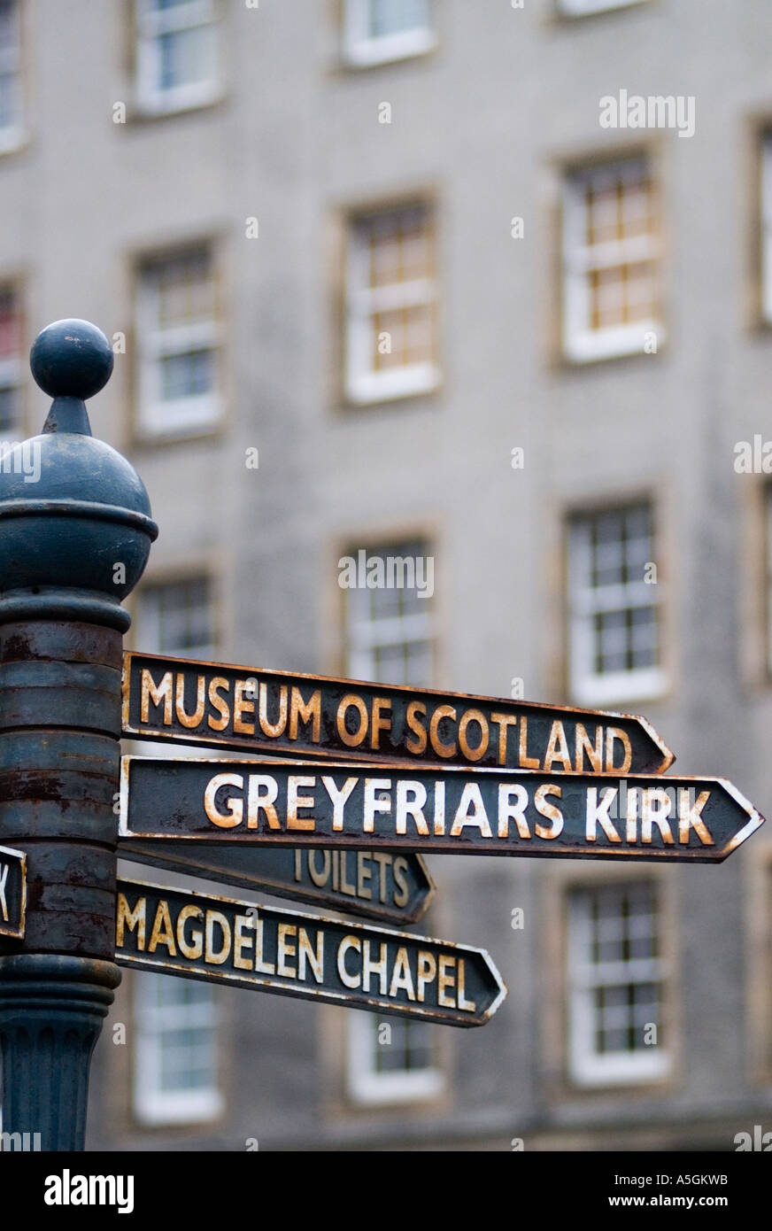 Old tourist direction signs in Grassmarket in Edinburgh`s Old Town ...