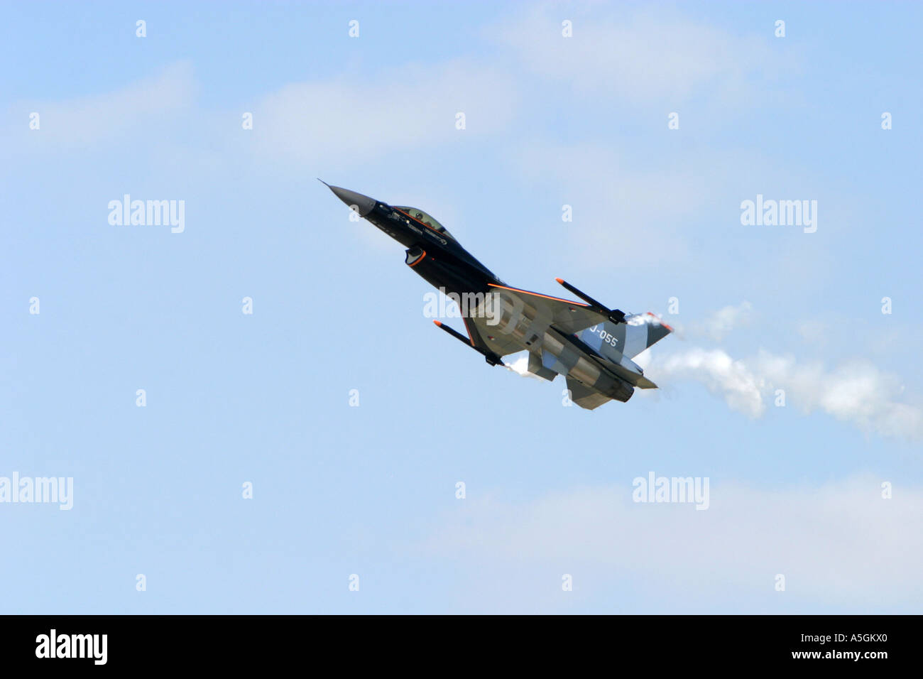 F16 military fighter jet performing an acrobatic display Stock Photo ...