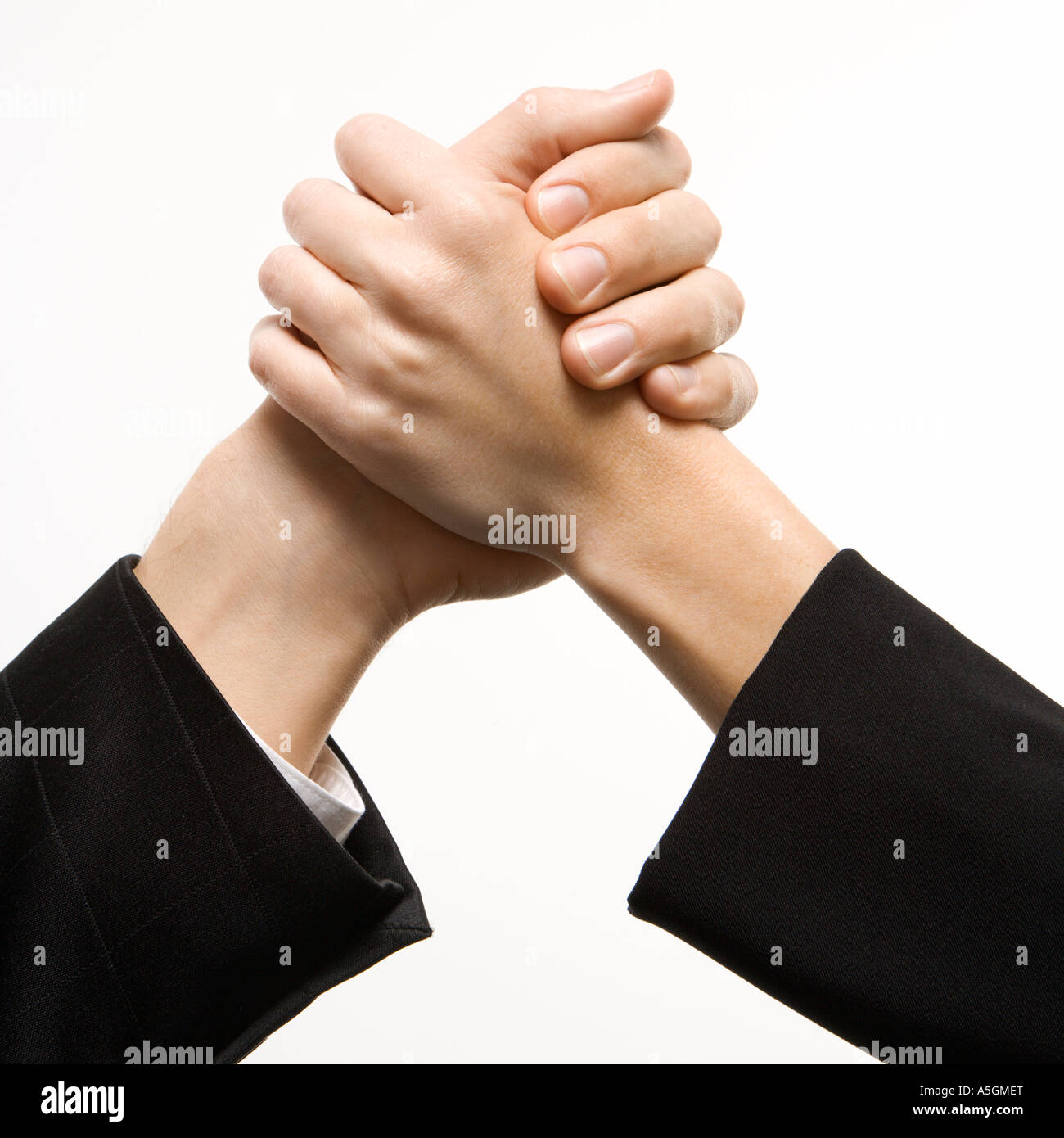 Close up of hands of Caucasian man and woman arm wrestling Stock Photo ...