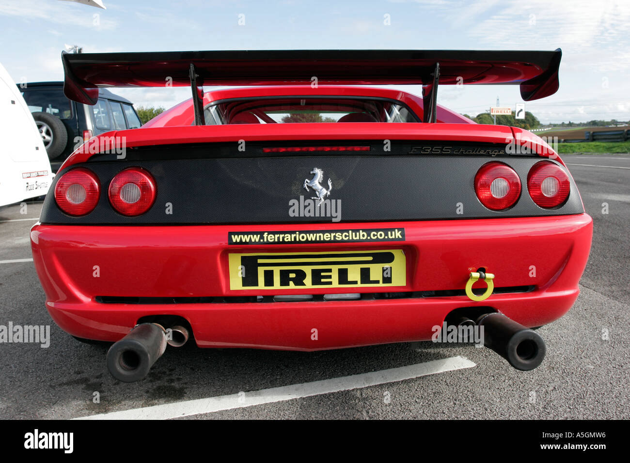 Ferrari sports car performing on the race track Stock Photo - Alamy