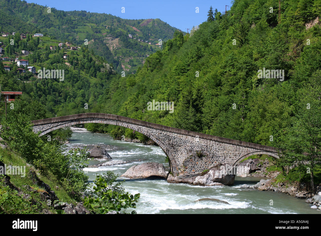 old arch bridge over mountain creek in the Pontical Mountains, Turkey ...