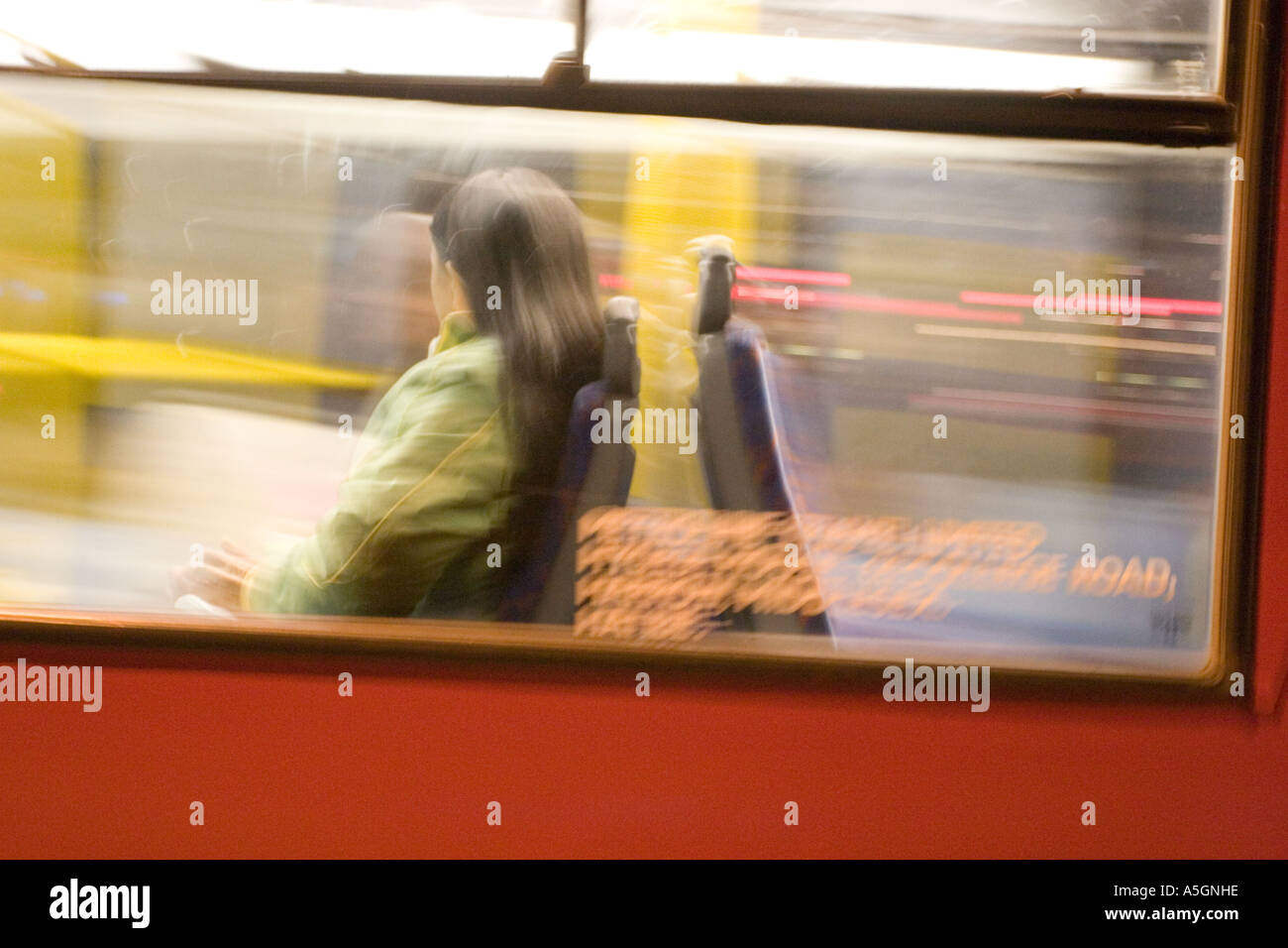 Passengers on a red London bus Stock Photo - Alamy