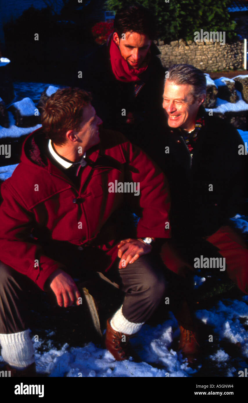 Three men chatting Stock Photo - Alamy